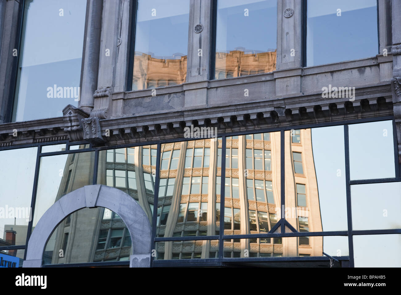 Reflection in glass windows of building Stock Photo - Alamy