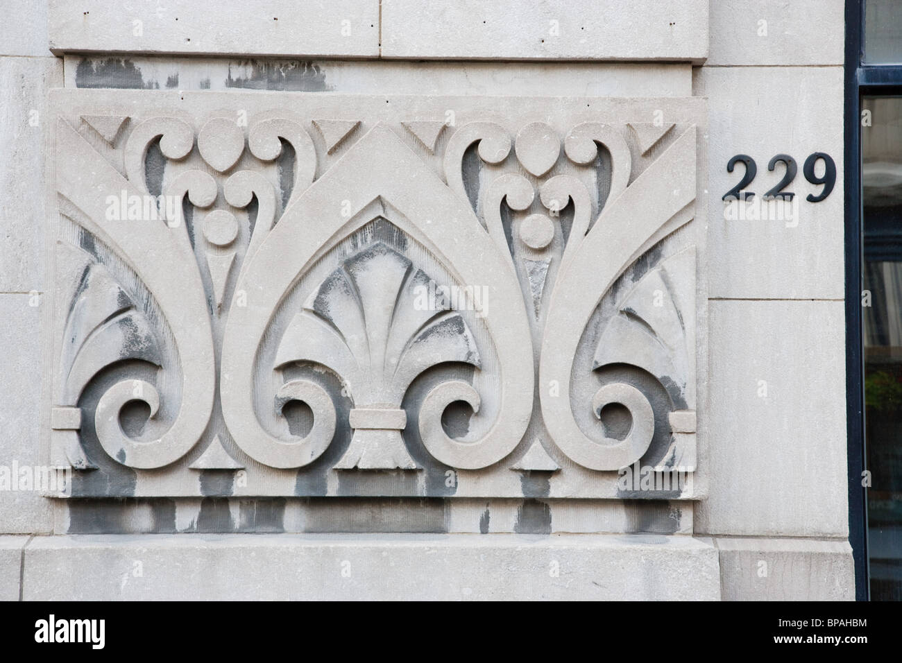 Floral design detail on building Stock Photo - Alamy