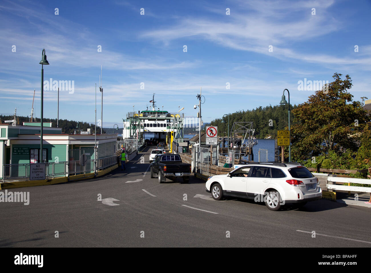 Vehicles boarding car ferry. Friday Harbor, San Juan Island, Washington ...