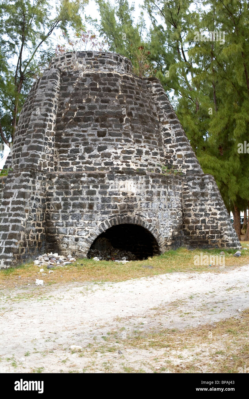 Stonework tower-like structure on beach. Flic en Flac, Mauritius Stock ...