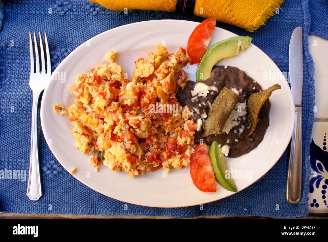 Huevos a la Mexicana and black beans breakfast in the restaurant of the ...