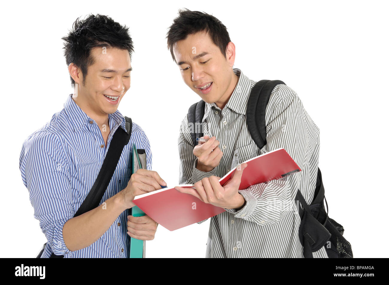 Male university students studying together Stock Photo - Alamy
