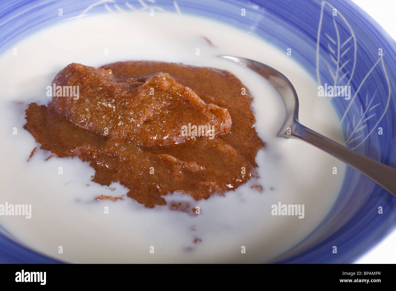 A bowl of African malted sorghum porridge with milk and sugar. South ...