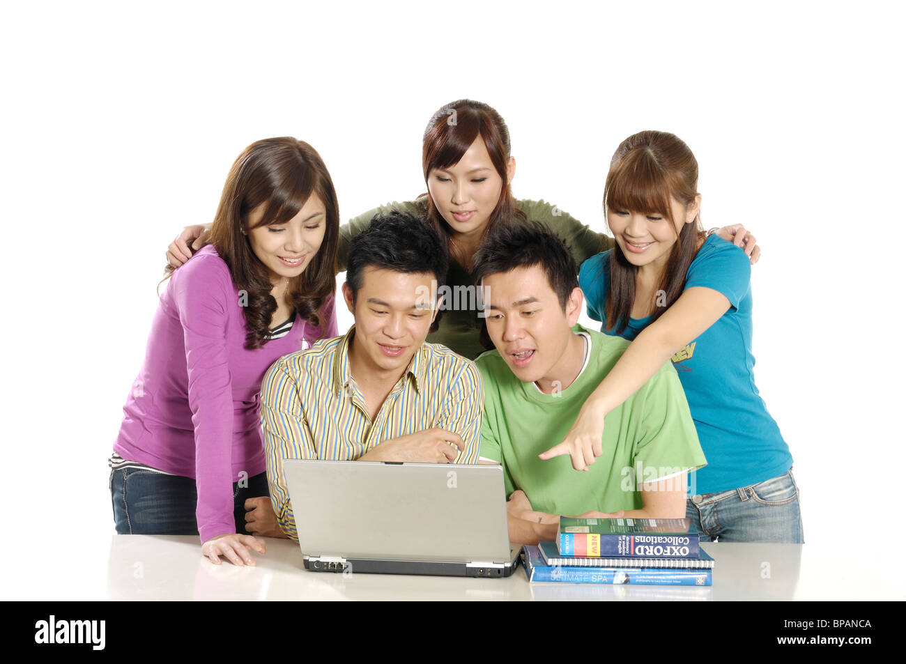 Group of university students studying together Stock Photo - Alamy