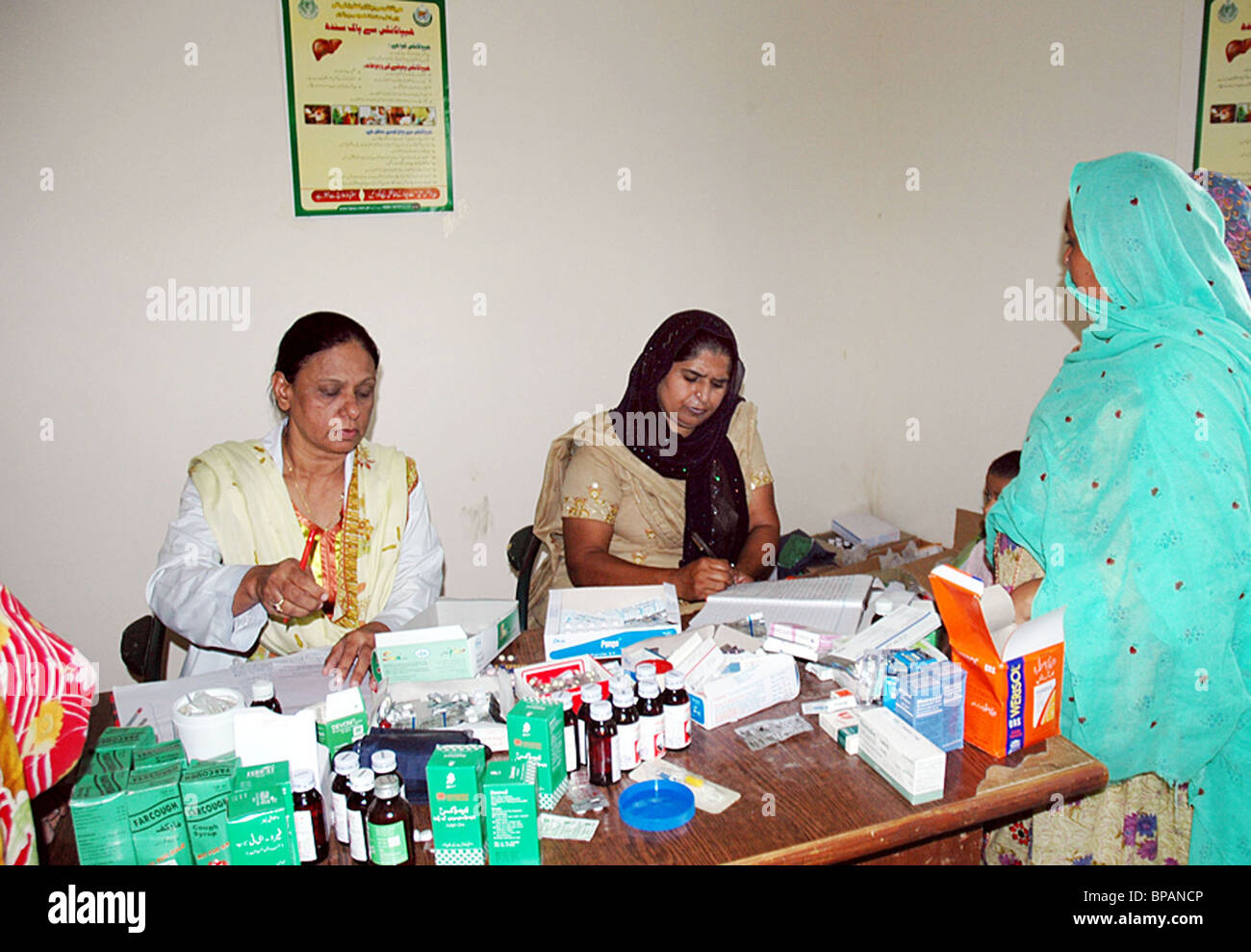 Doctors examine patients at affectees relief camp established at ...
