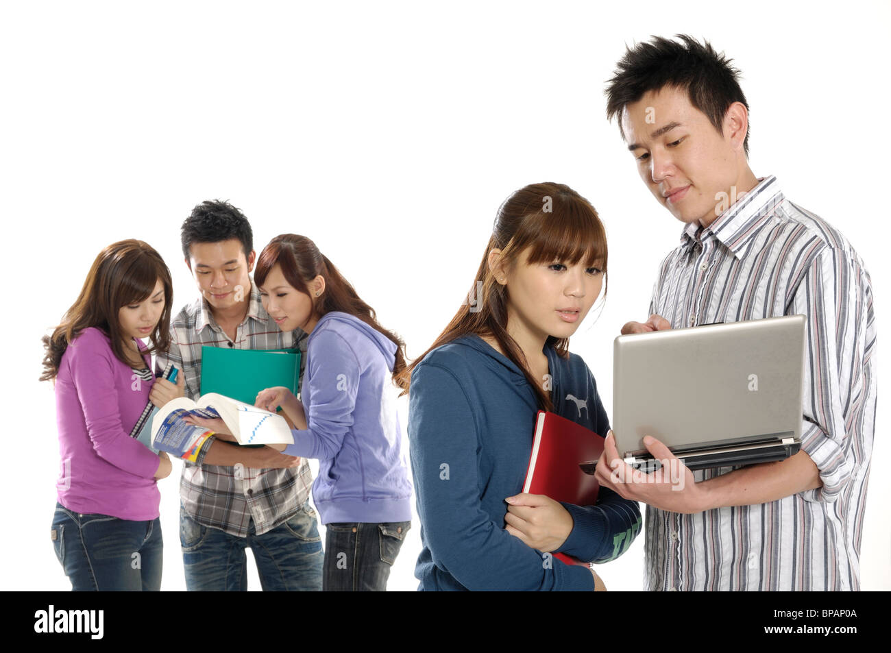 Group of university students studying together Stock Photo - Alamy