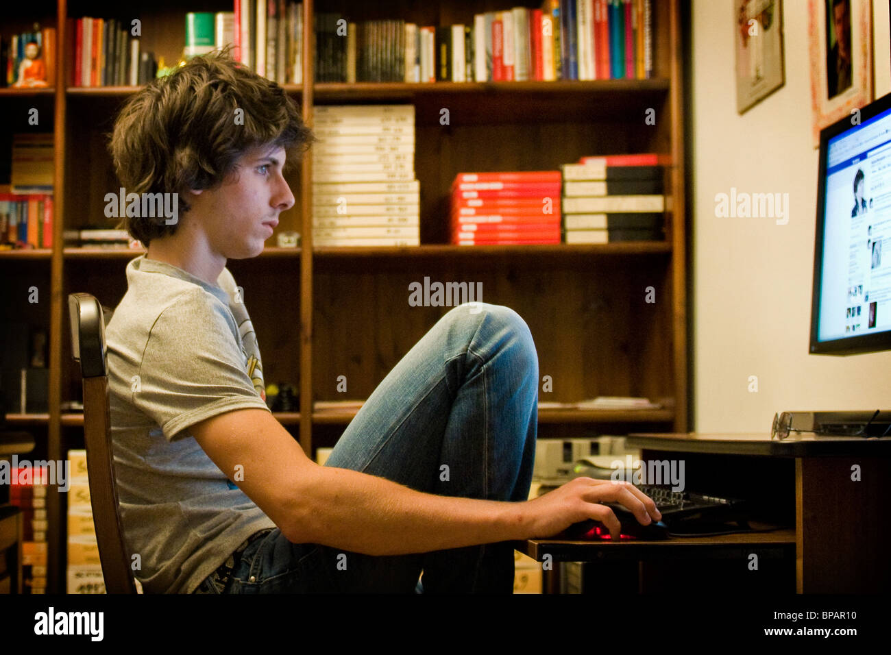 young people, boy at computer Stock Photo - Alamy