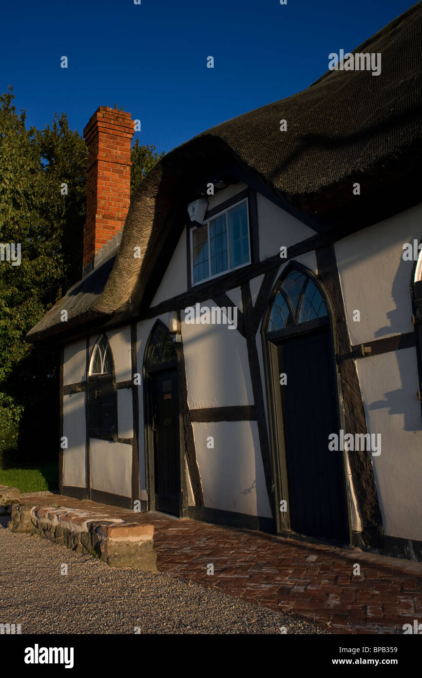 Black white timber framed thatched cottage hi-res stock photography and ...