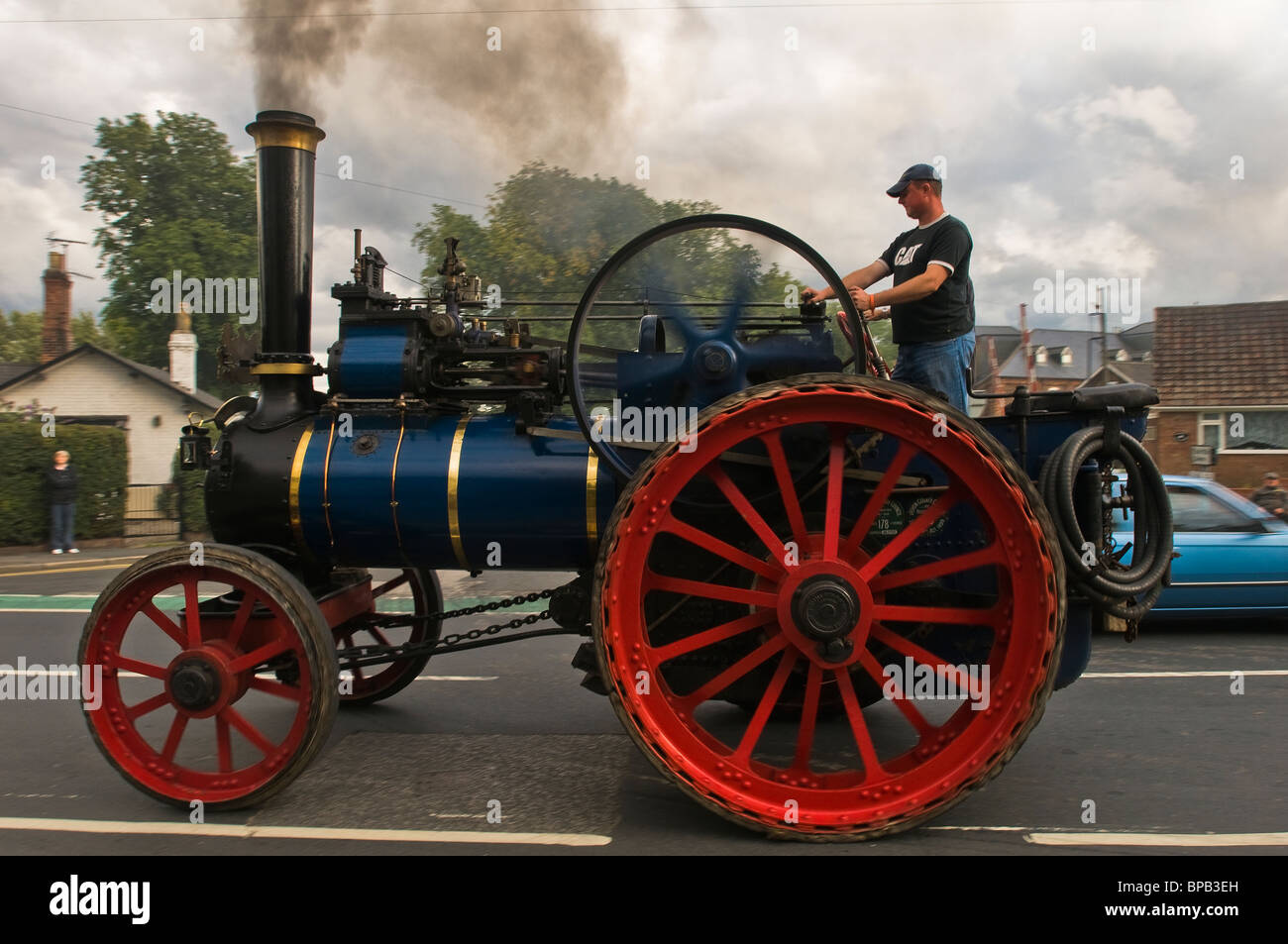 A vintage steam traction engine parades through streets during the 2009 ...