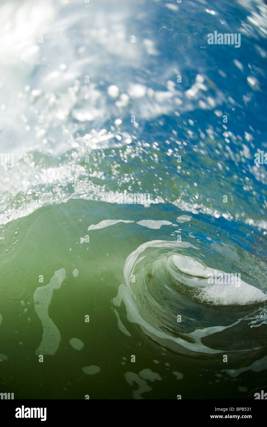 Inside the tube of a breaking wave Stock Photo - Alamy