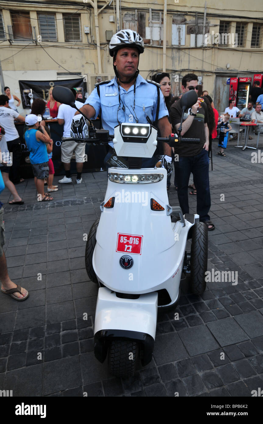 Israel, Haifa, Israeli policeman on a T3 series Electric Stand-up ...
