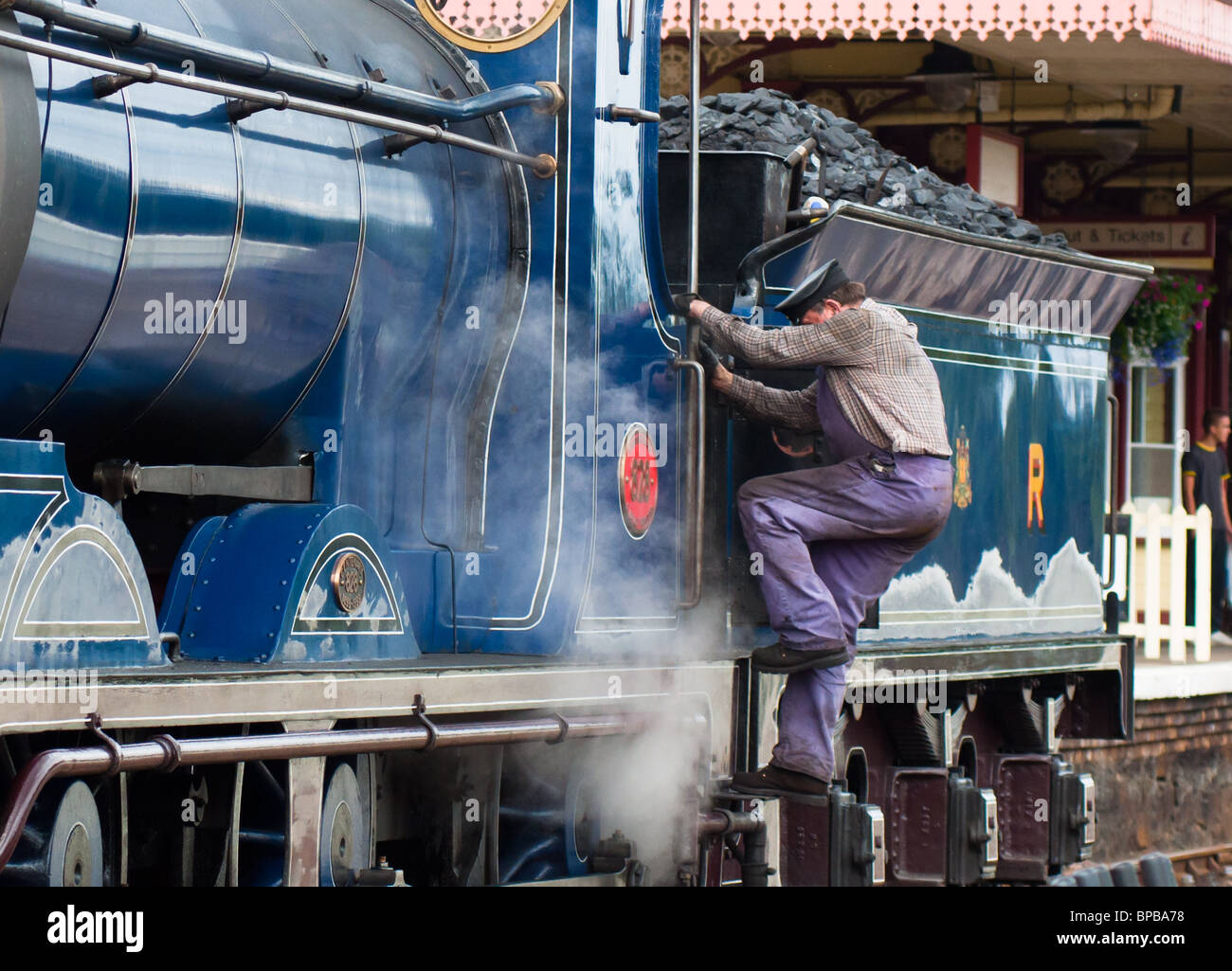 The Caledonian Railway Number 828 with its driver at Aviemore station ...