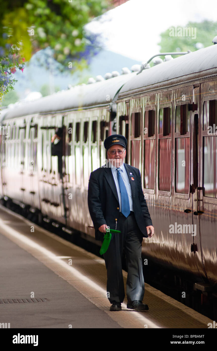 Station guard and carriages belonging to The Caledonian Railway Number ...