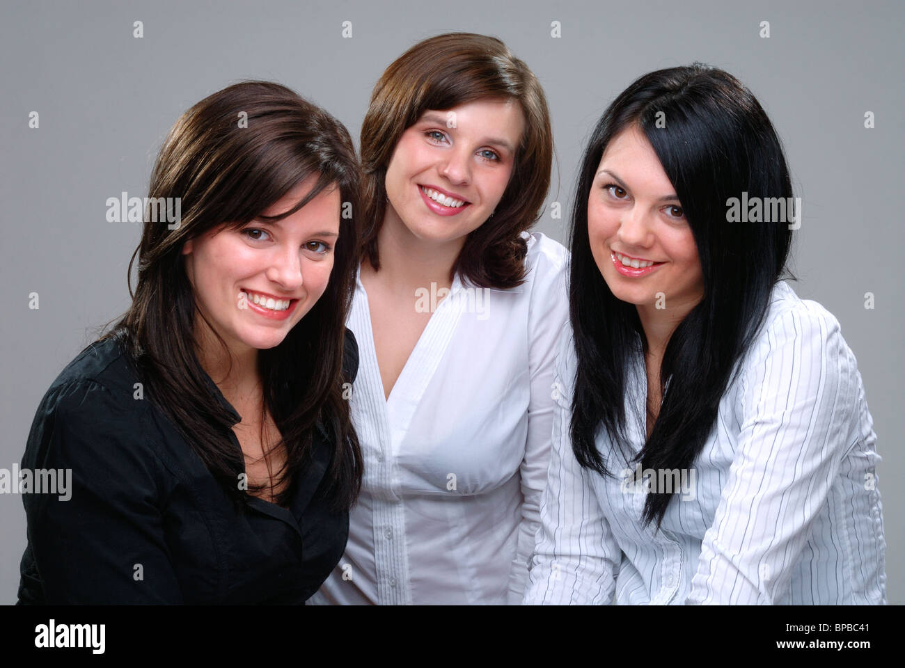 Three Women Having A Good Time Chatting And Laughing At A Party Stock ...