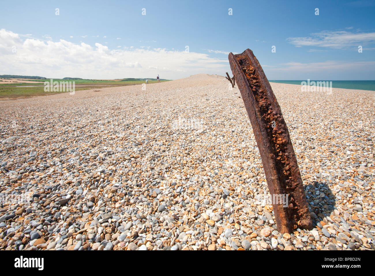 The storm beach at Cley breached by severe storms which will only ...