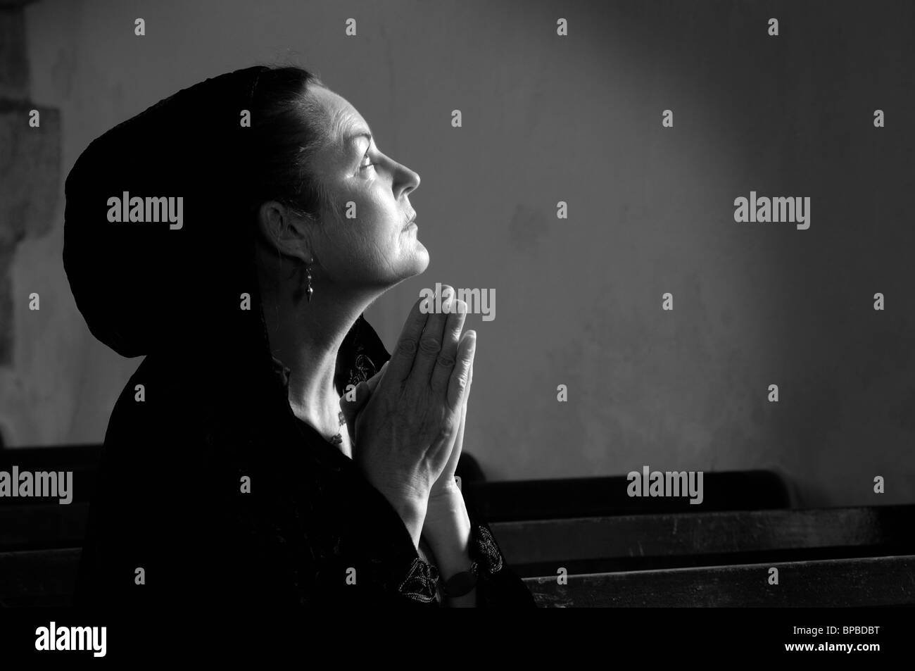 Woman prayer hands meditating Black and White Stock Photos & Images - Alamy