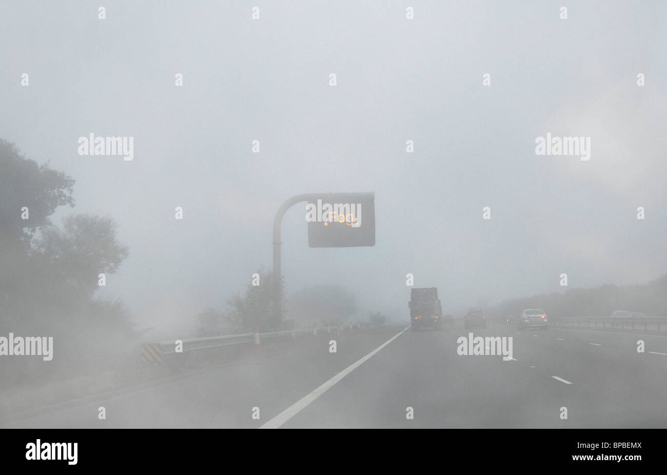 Fog Foggy Weather Driving Motorway Road Sign High Resolution Stock ...