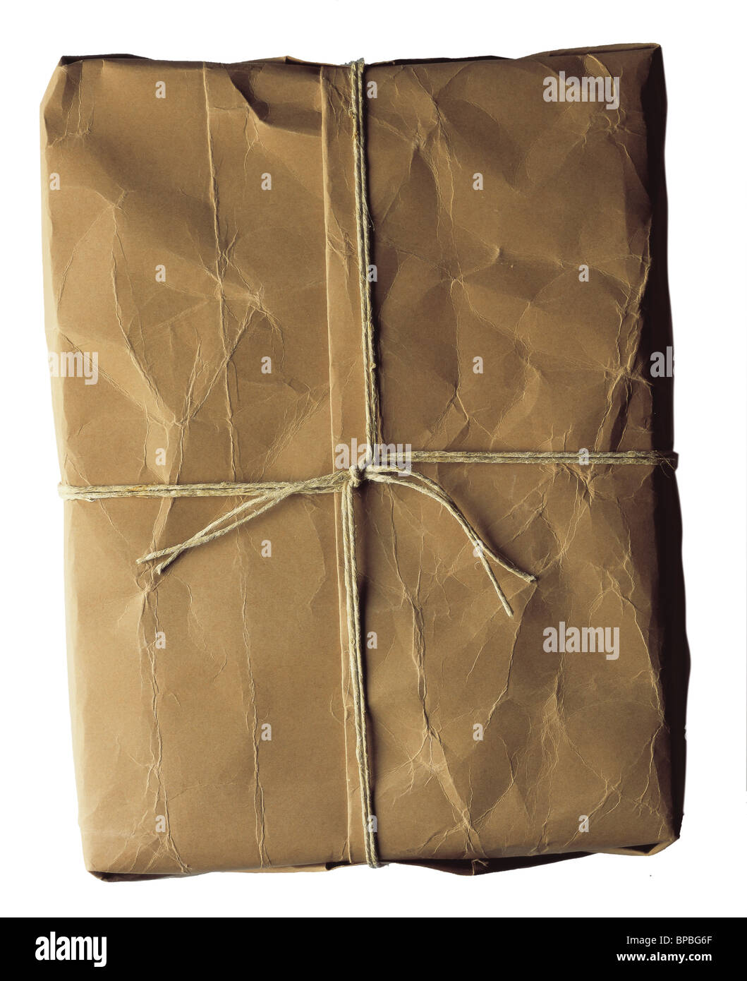 package wrapped in brown paper and tied with a string Stock Photo - Alamy