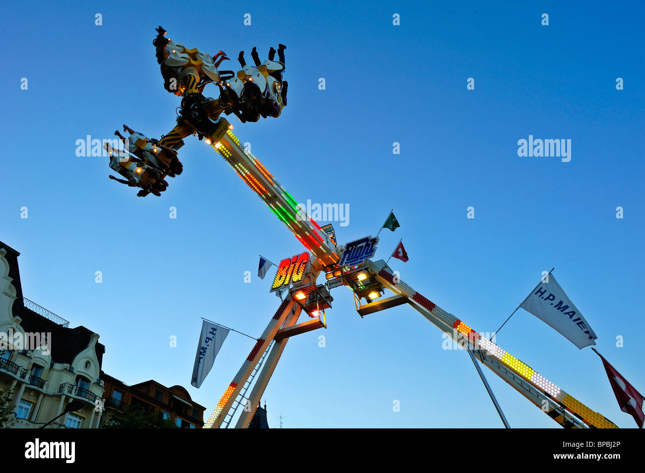 Fairground ride in full swing Stock Photo - Alamy