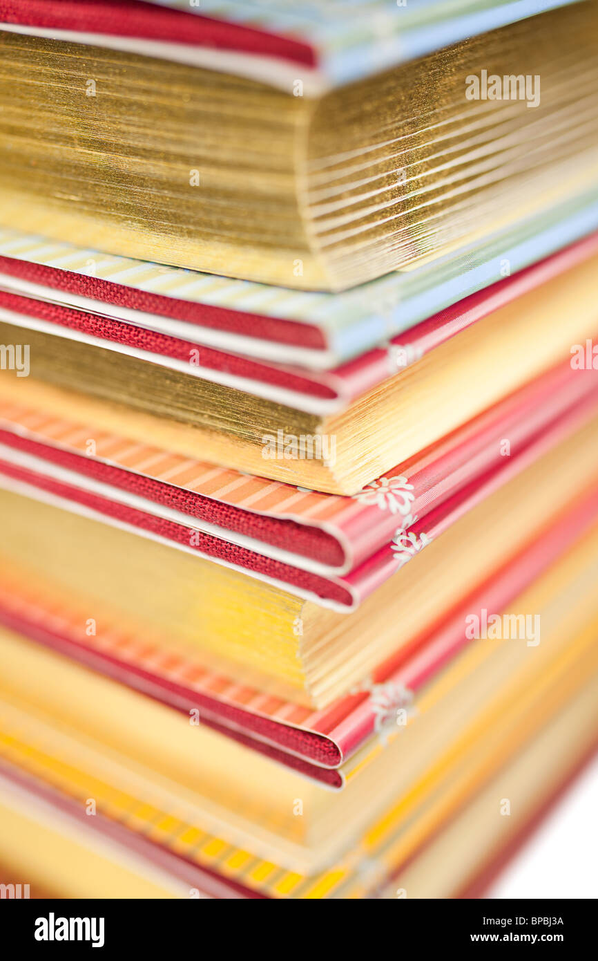 Stack of collectible golden books isolated on white background Stock ...