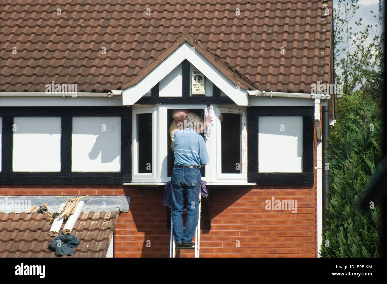 Wooden houses with bay windows hi-res stock photography and images - Alamy