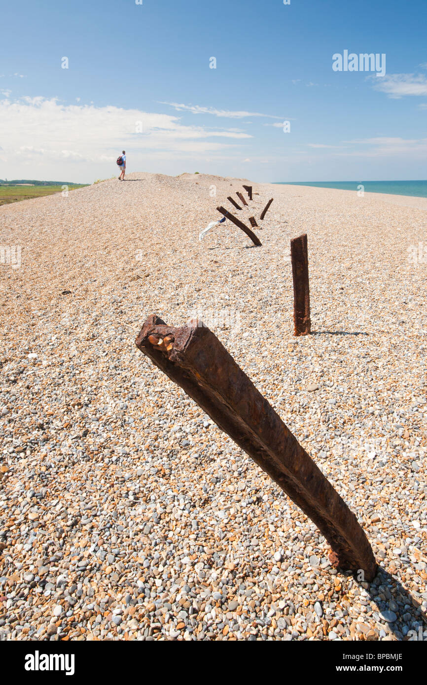 The storm beach at Cley breached by severe storms which will only ...