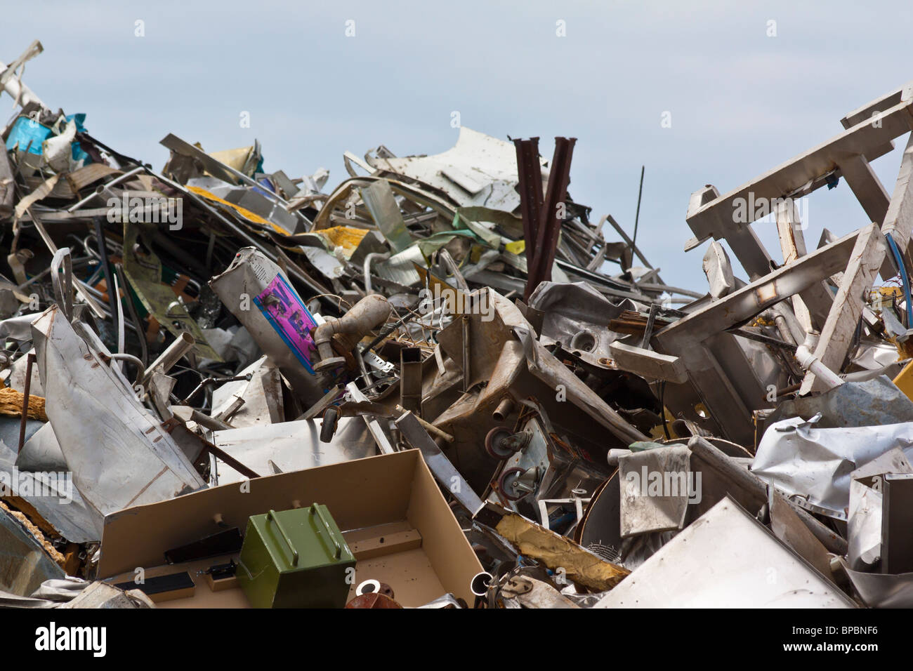 Scrap metal recycling industry company processingin closeup low angle ...