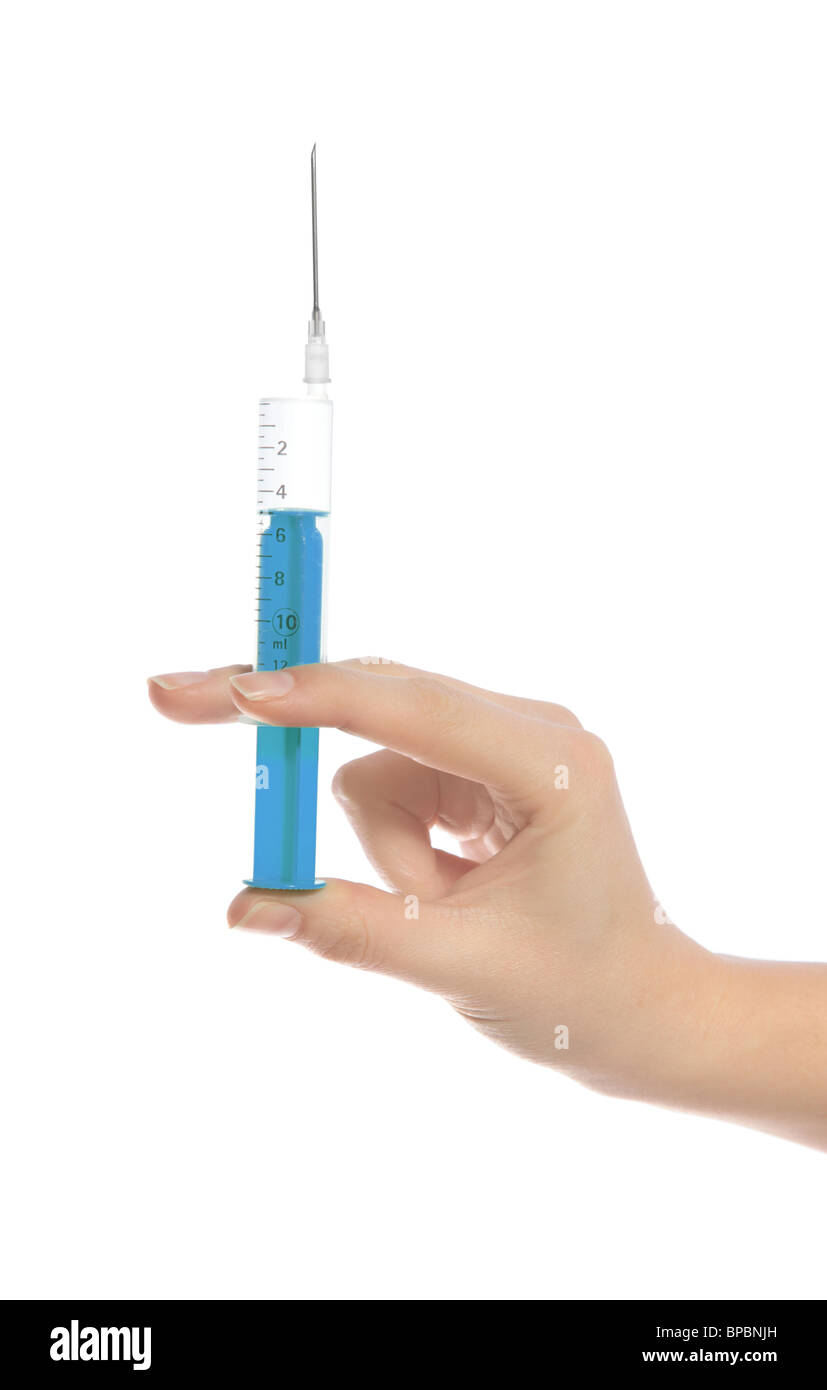 A human hand holding a syringe. All isolated on white background Stock ...