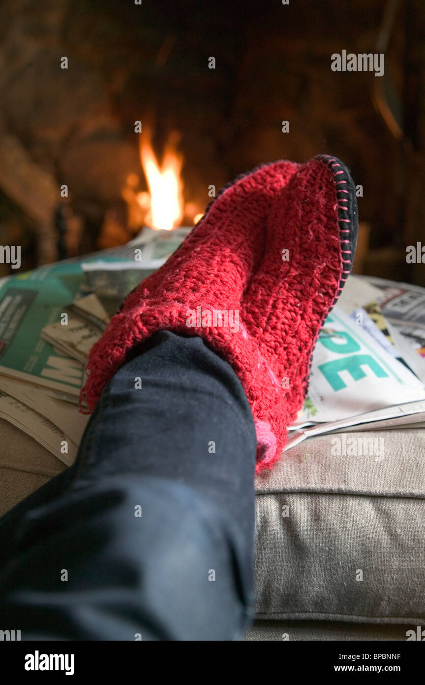 Feet in front of a fire hi-res stock photography and images - Alamy