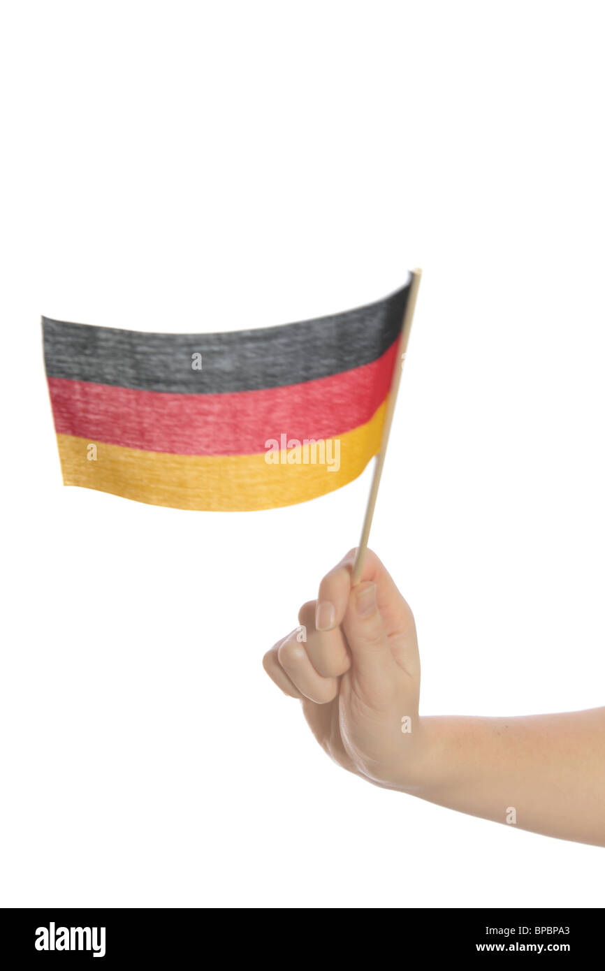 A human hand waves a german flag. All isolated on white background ...