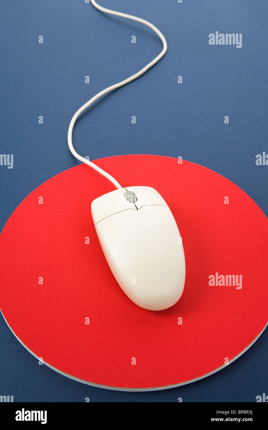 computer mouse with blue background Stock Photo - Alamy