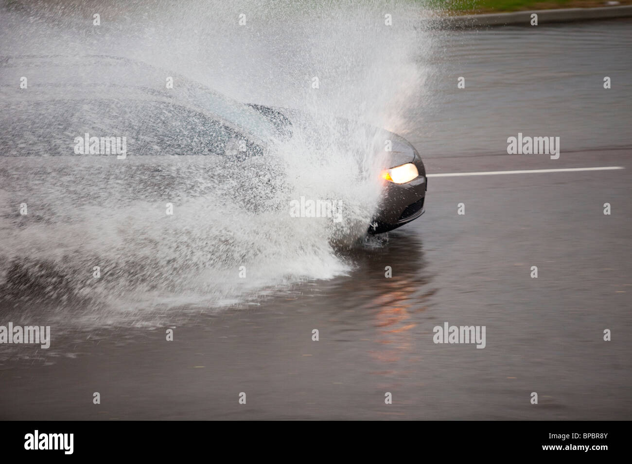 Car diving in pool of water Stock Photo - Alamy
