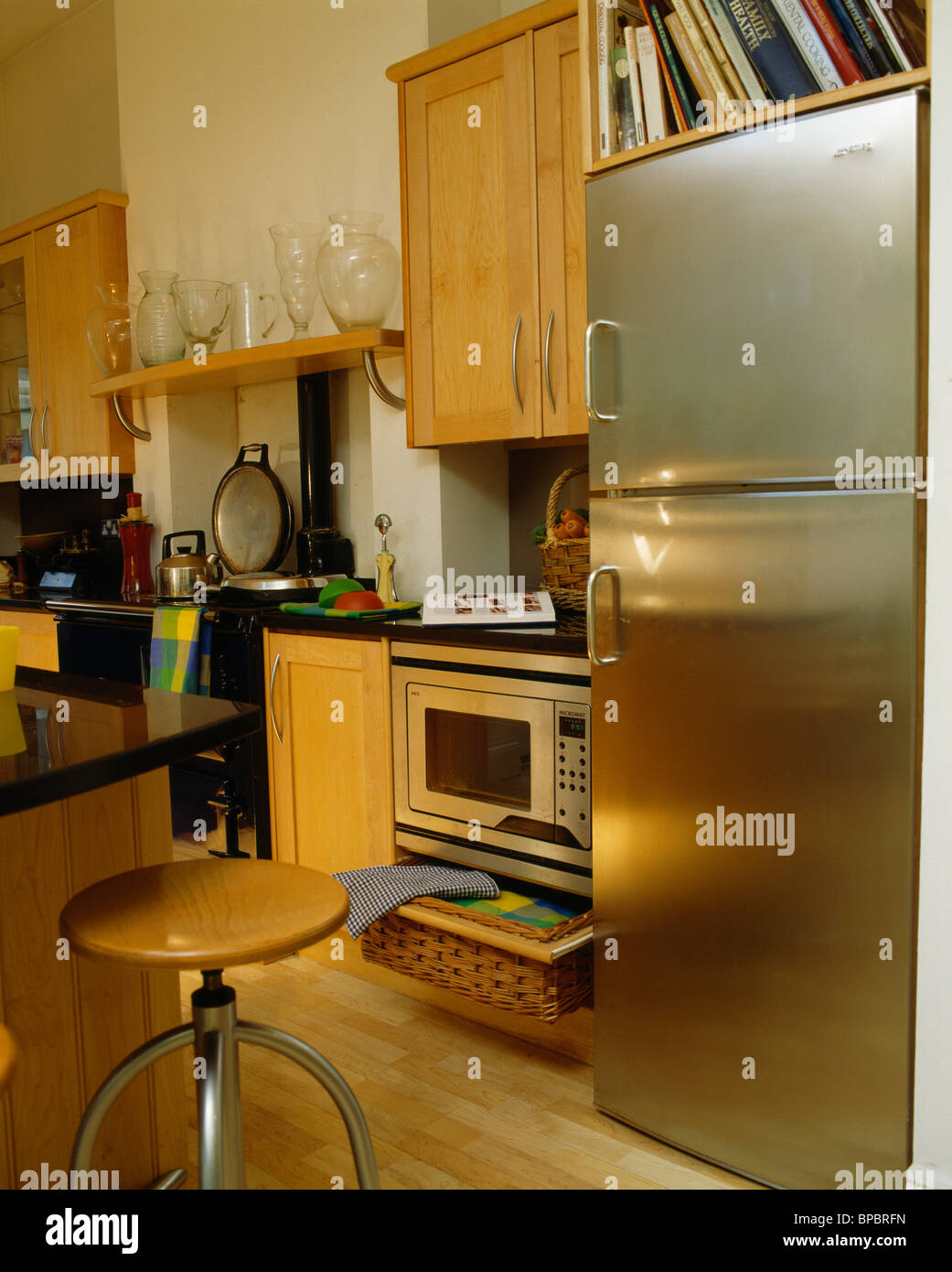 Large stainless-steel fridge-freezer in modern kitchen Stock Photo - Alamy
