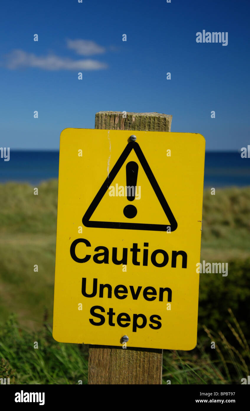 Caution uneven steps sign alnmouth hi-res stock photography and images ...