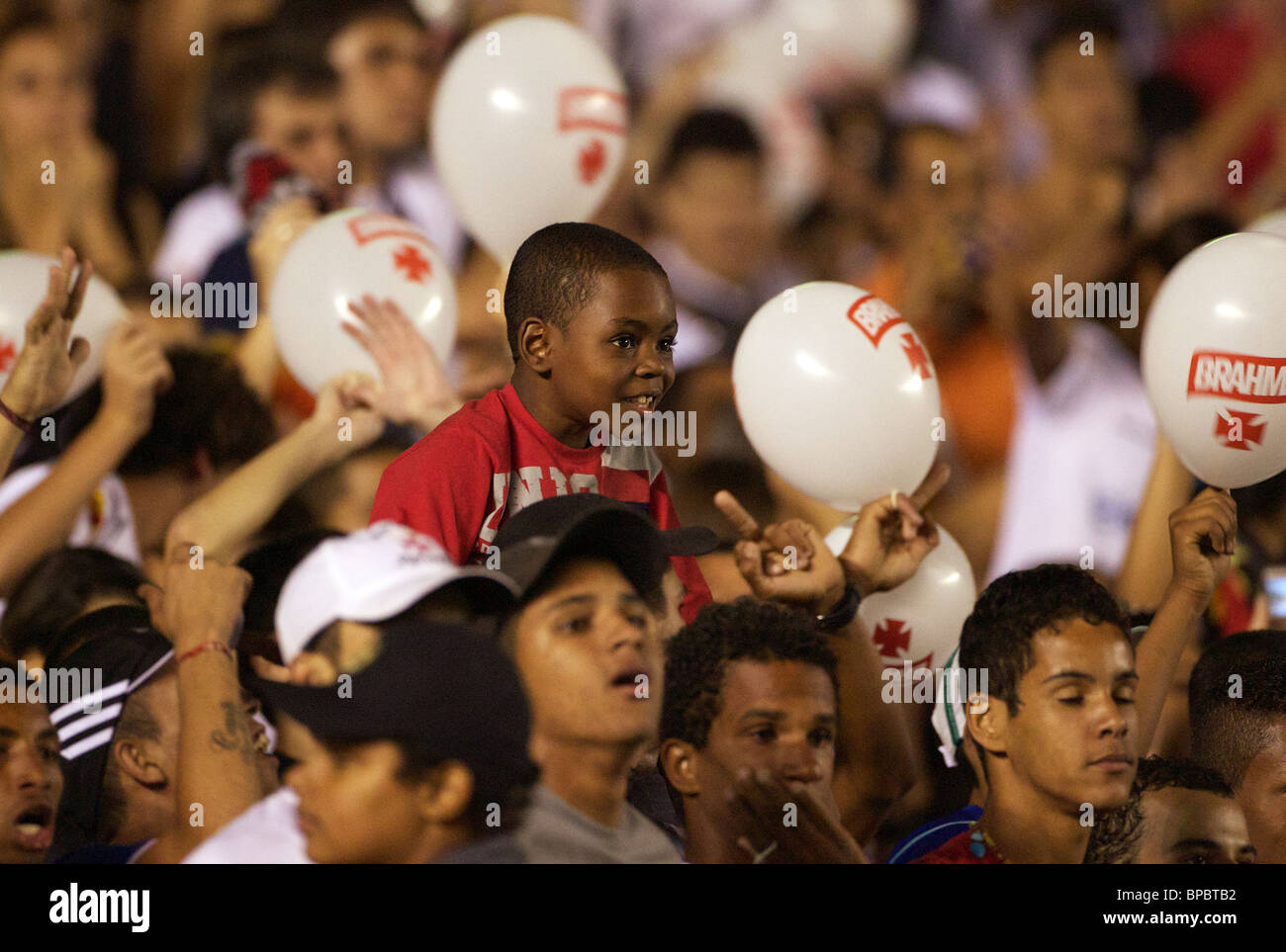 A young Vasco fan in the crowd as Vasco fans support their team during ...