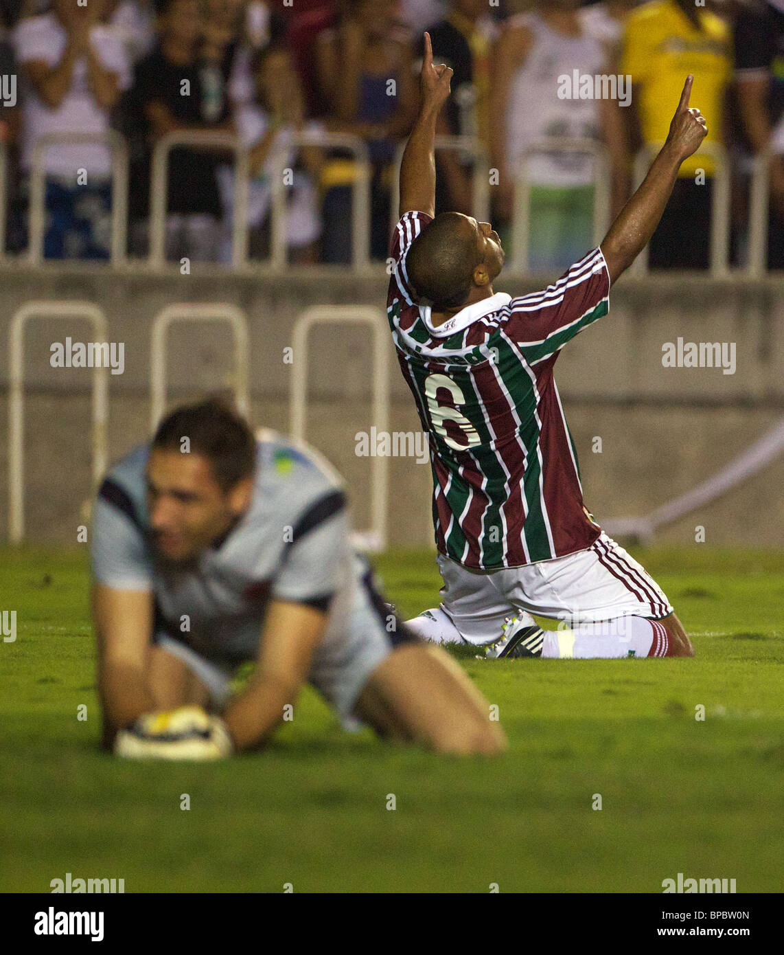 Julio Cesar (right) celebrates with team mates after scoring for ...