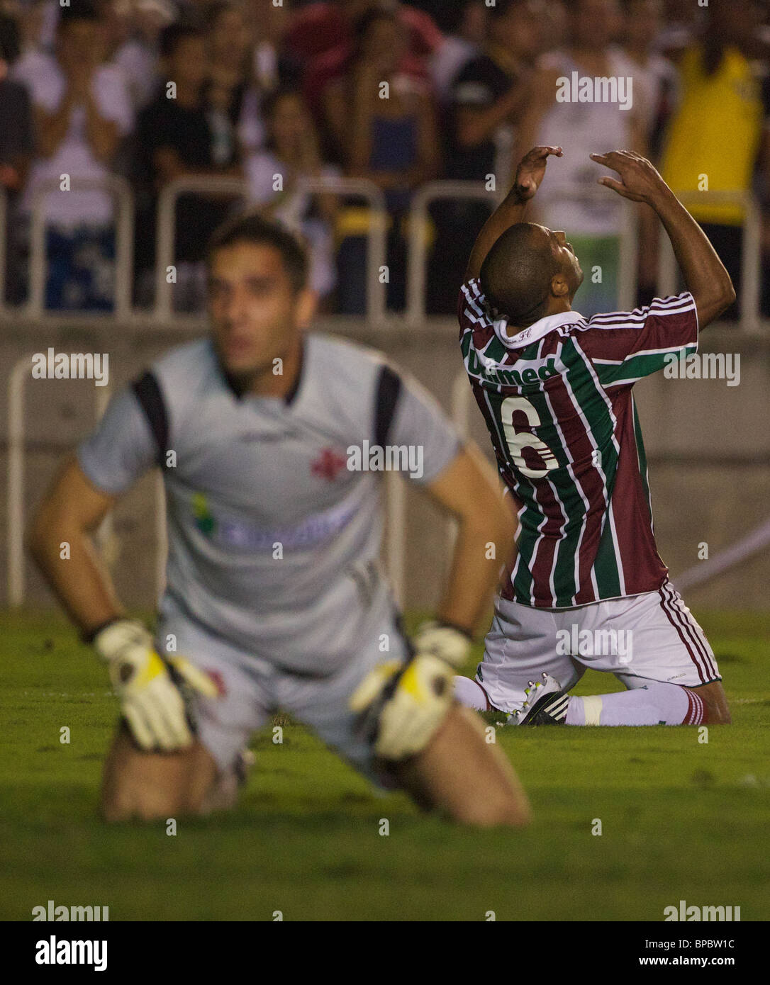 Julio Cesar (right) celebrates with team mates after scoring for ...