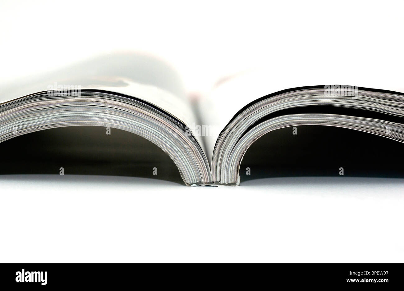 High key photo of magazine on white background Stock Photo - Alamy