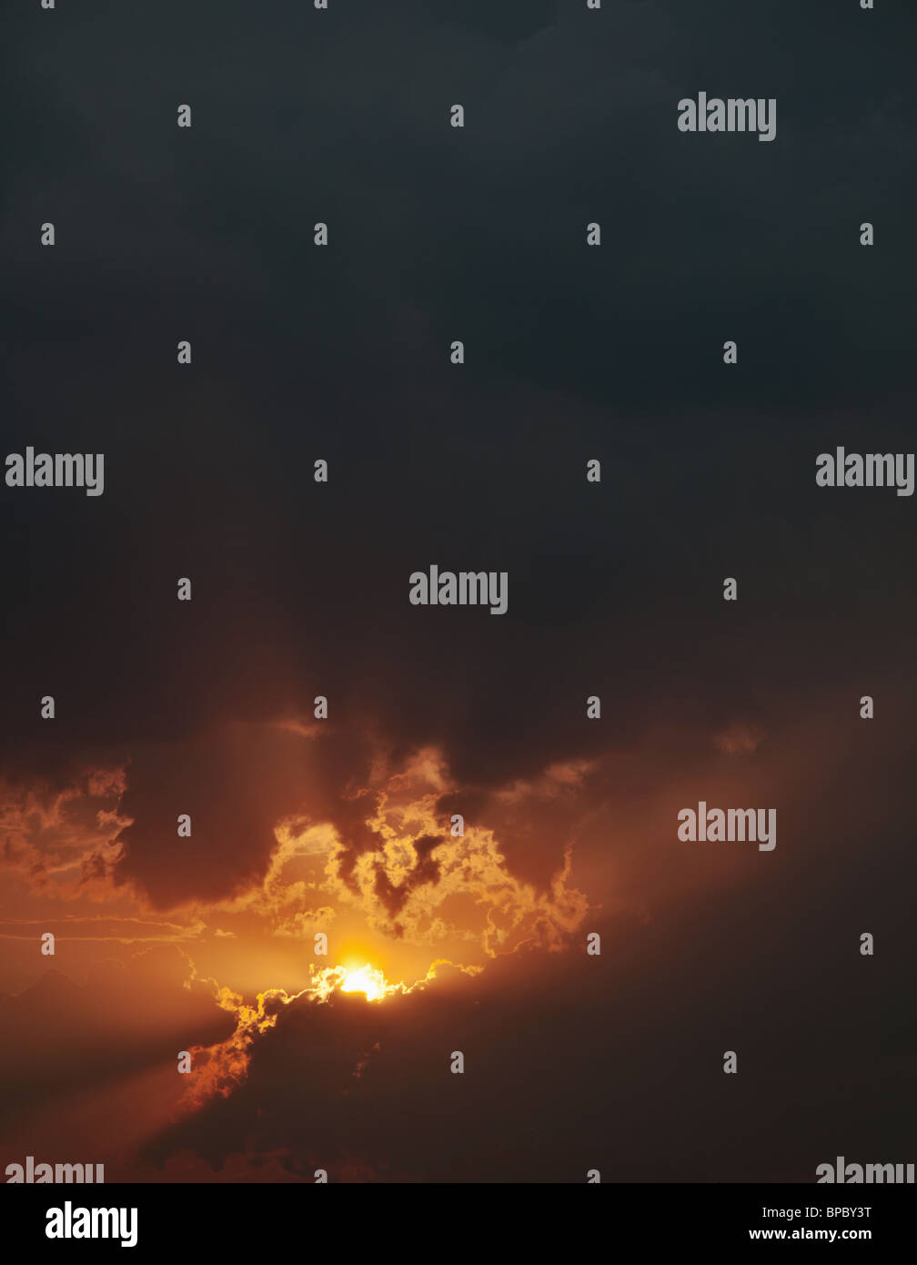 The fiery sunset - a vertical composition. Background Stock Photo - Alamy