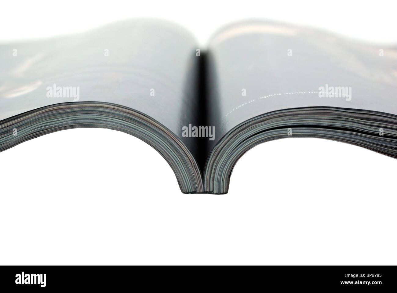 Magazine close-up isolated on white background Stock Photo - Alamy