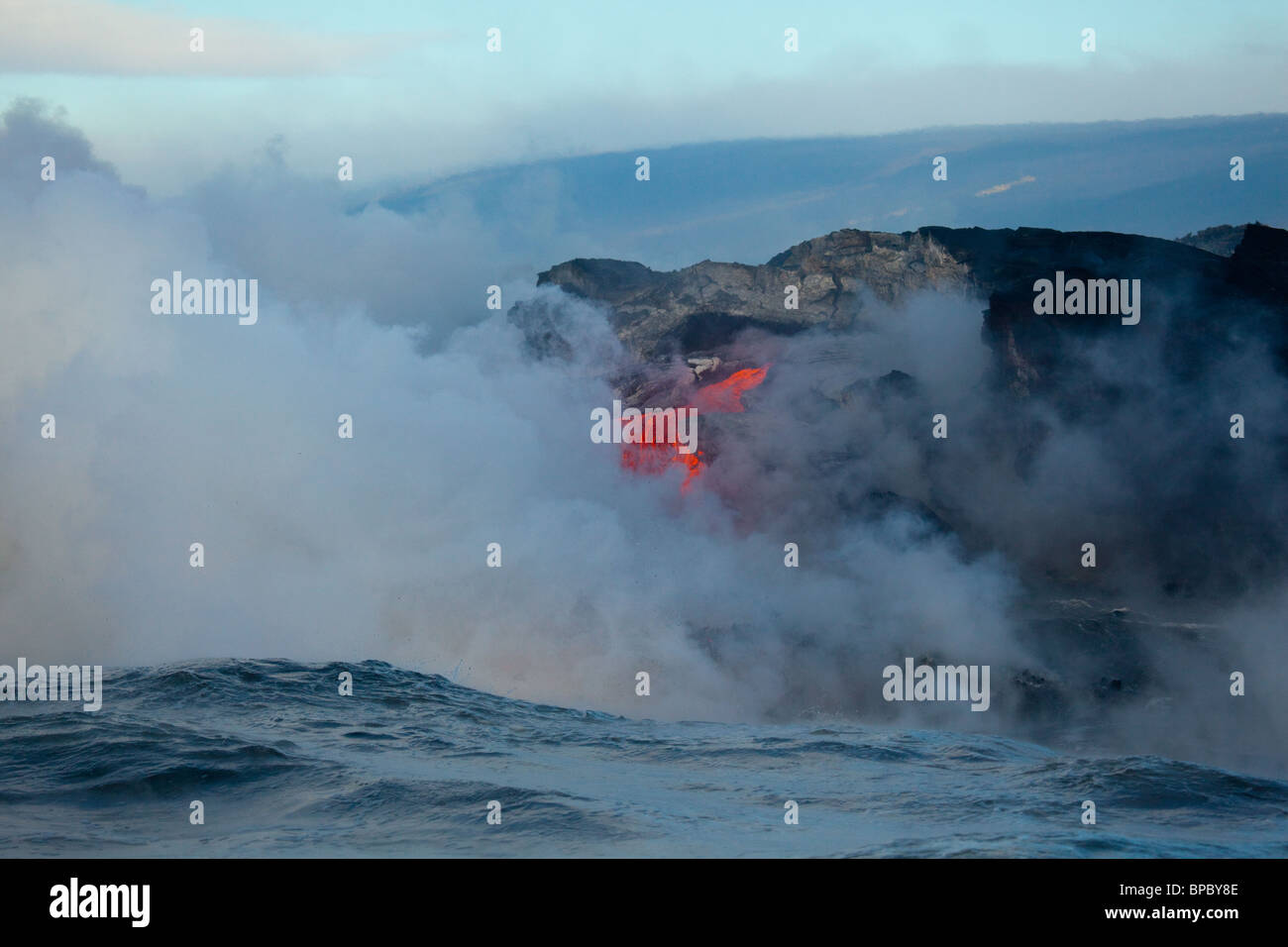 Lava flowing into the ocean Stock Photo - Alamy