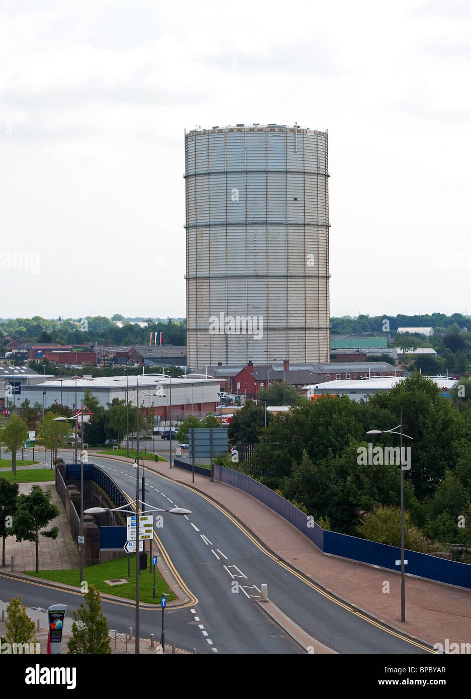 a gasometer on the edge of the town centre in st.helens, lancashire, uk ...