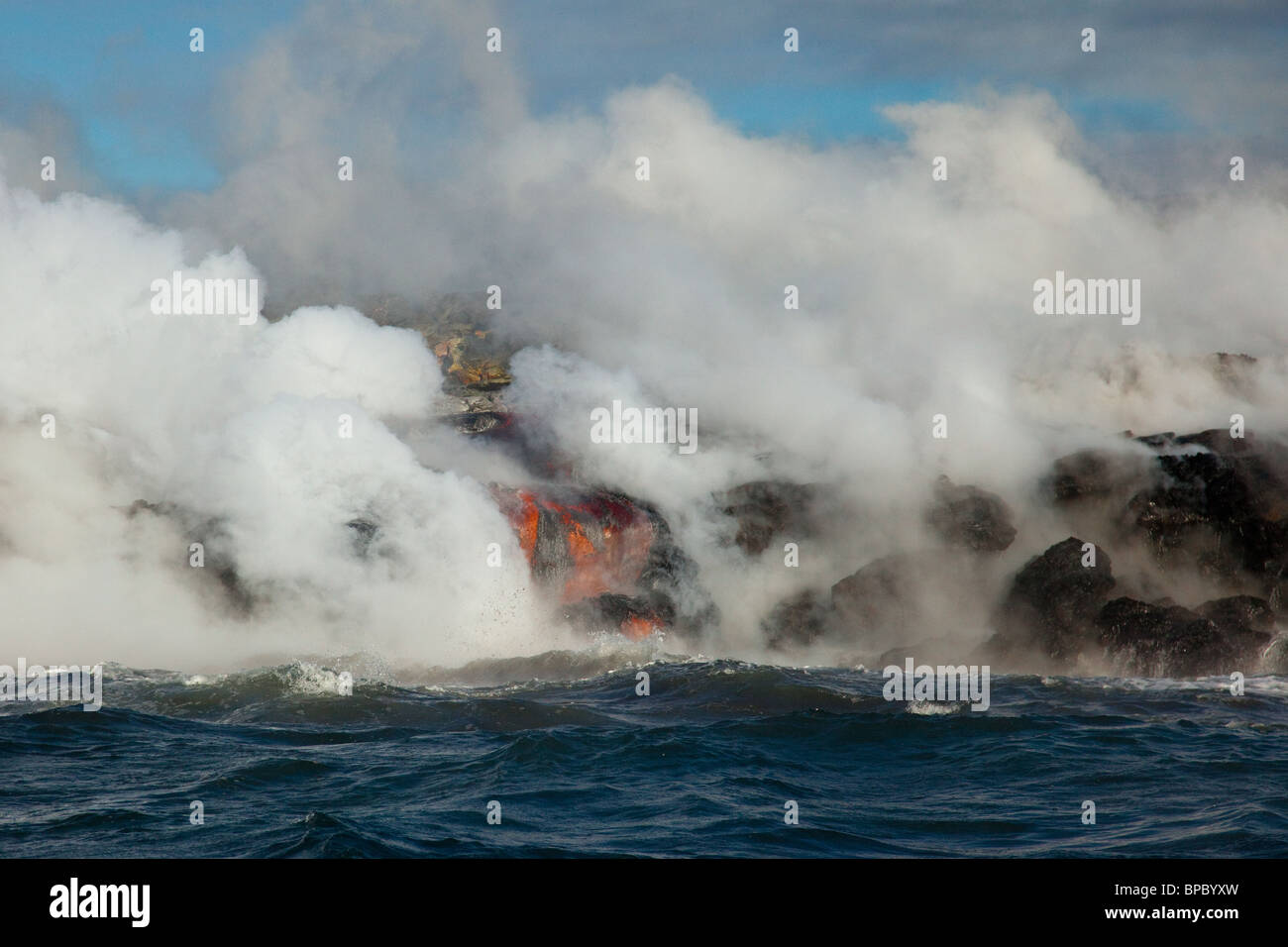 Lava flowing into the ocean Stock Photo - Alamy