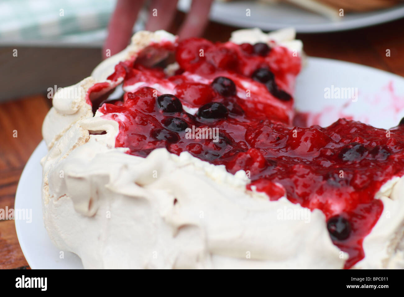 Fruit meringue - red berries Stock Photo - Alamy