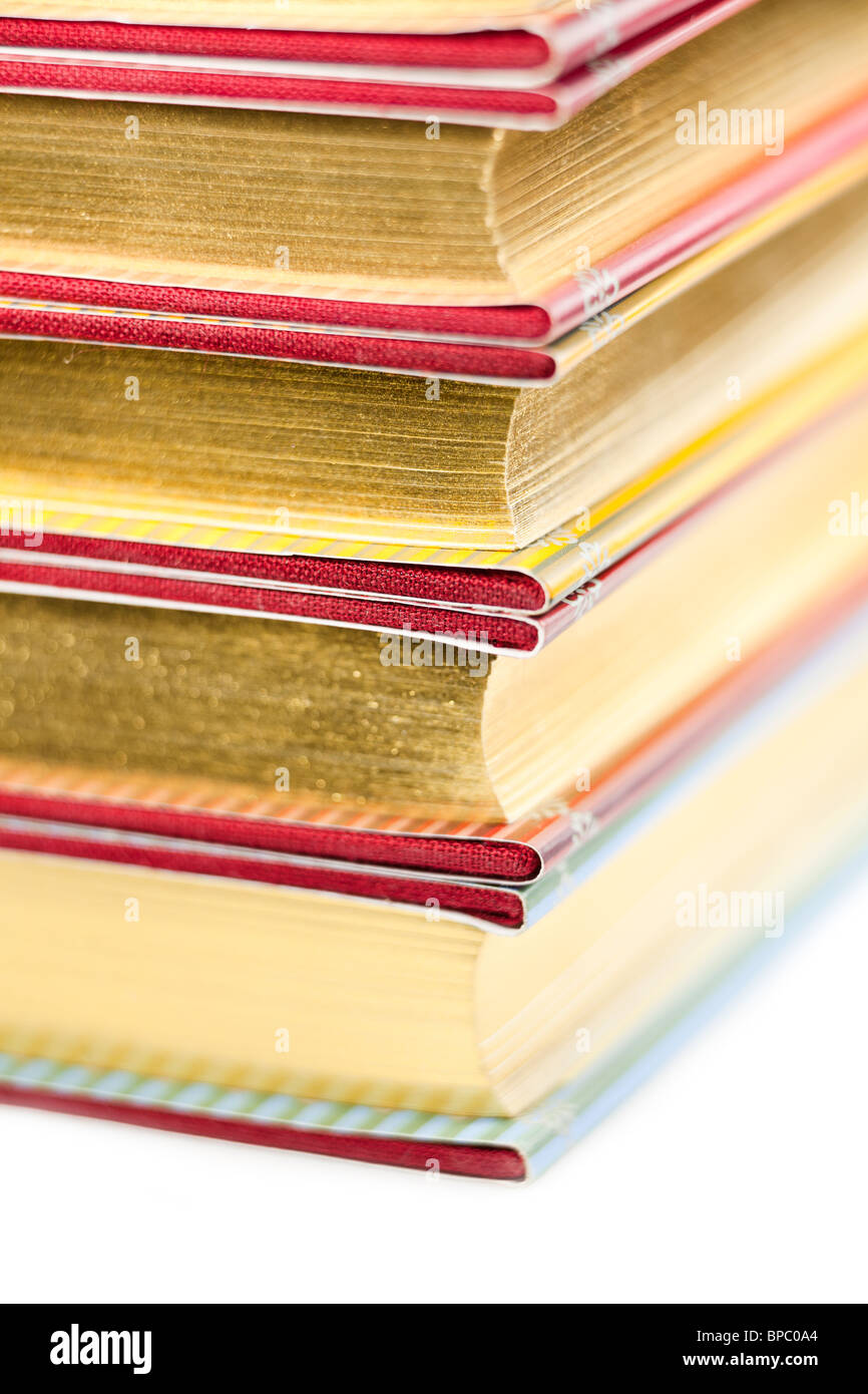 Stack of collectible golden books isolated on white background Stock ...