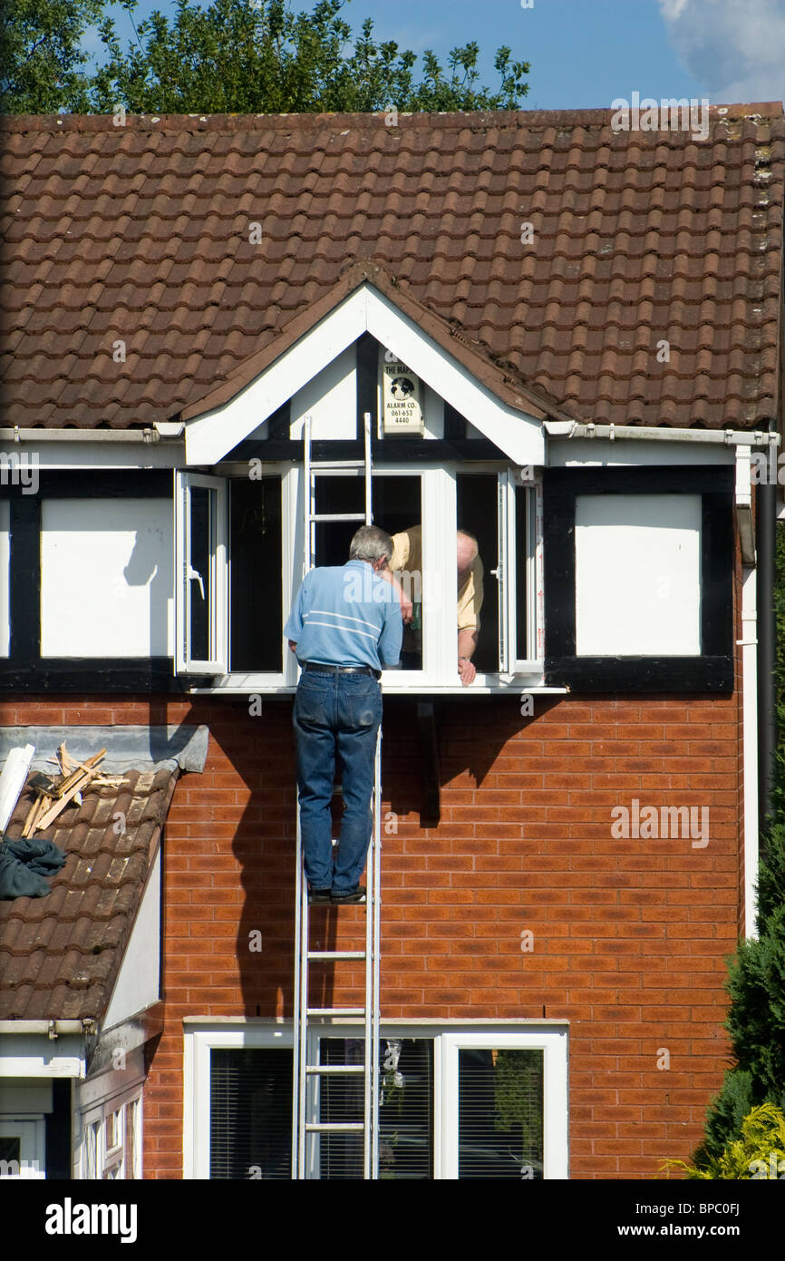 Wooden houses with bay windows hi-res stock photography and images - Alamy