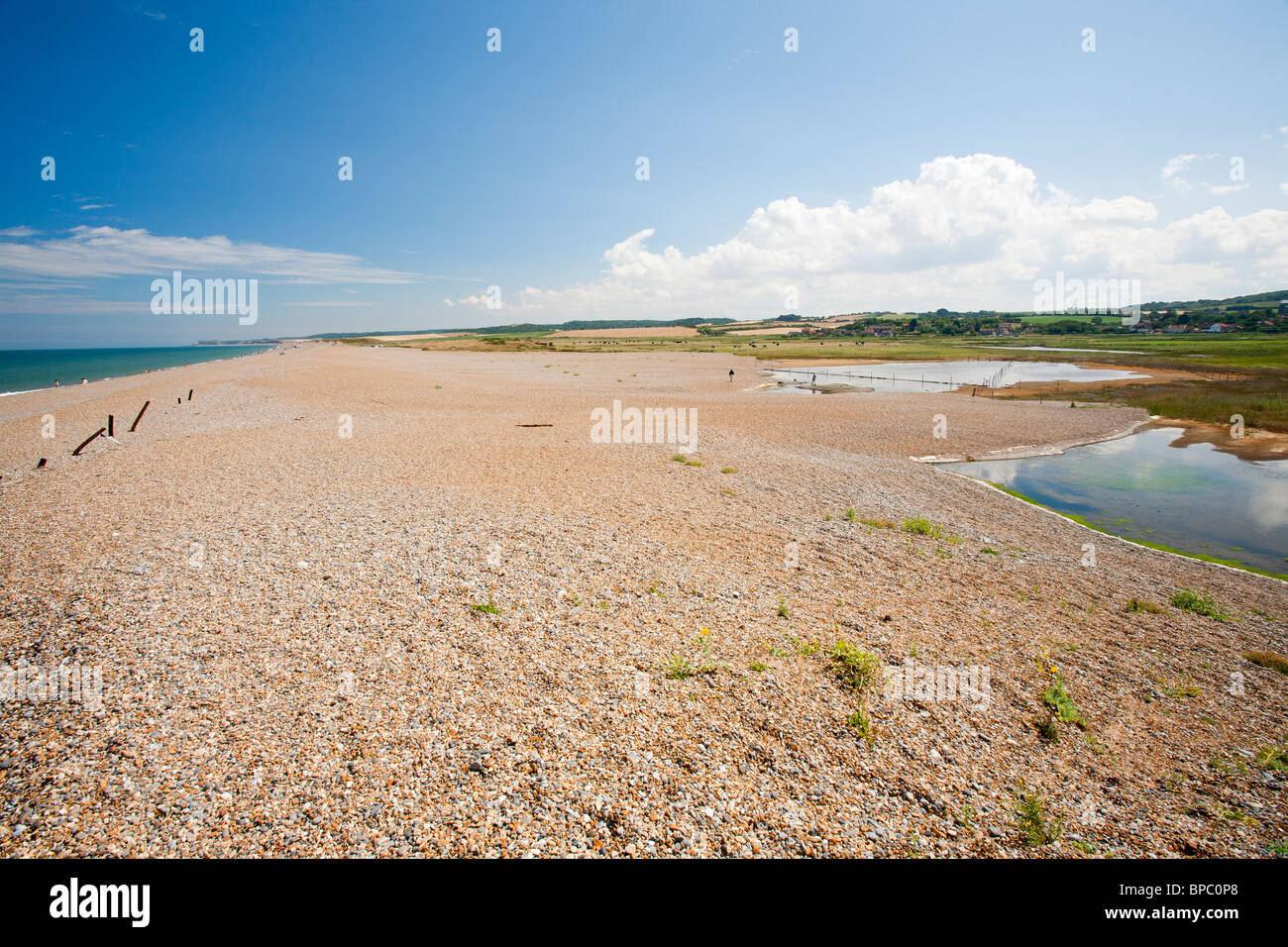 The storm beach at Cley breached by severe storms which will only ...