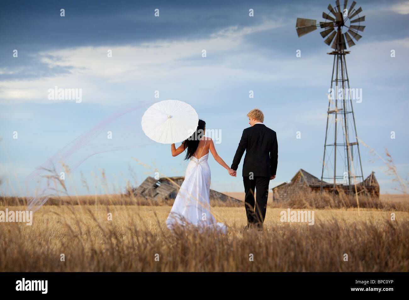 Man walking across fields hi-res stock photography and images - Alamy