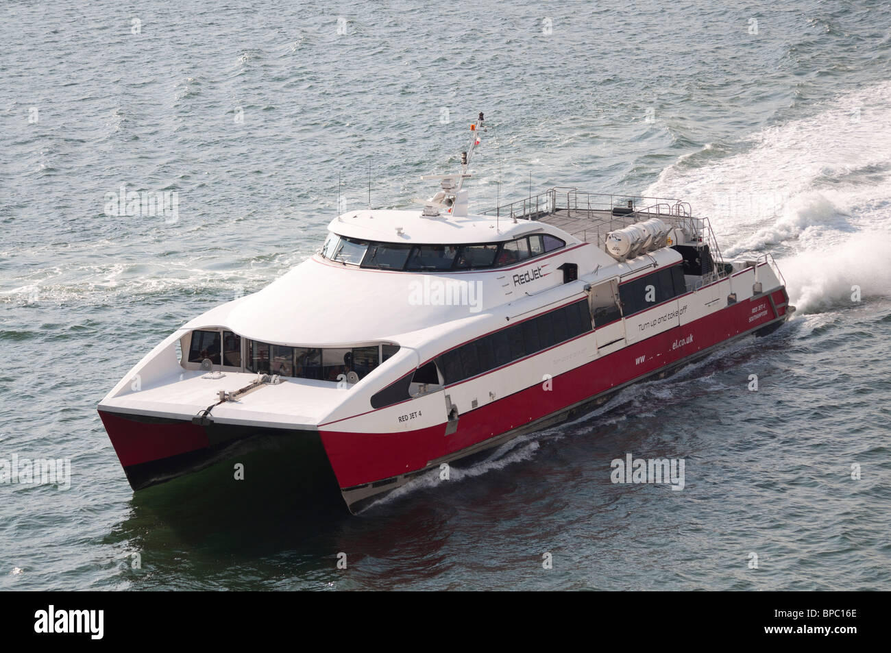 A Red Jet 4 passenger catamaran transporting passengers from ...