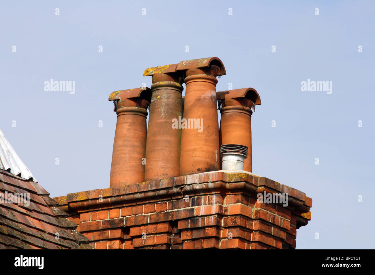 Chimney stacks on a roof in Streatley Stock Photo - Alamy